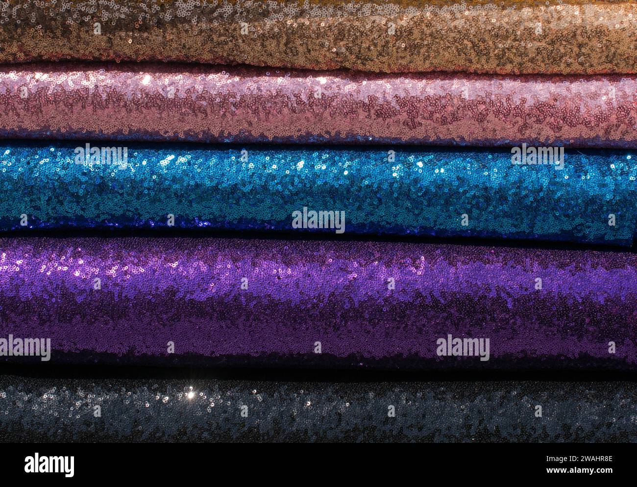 Examples of bright fabric of various color in view Stock Photo - Alamy