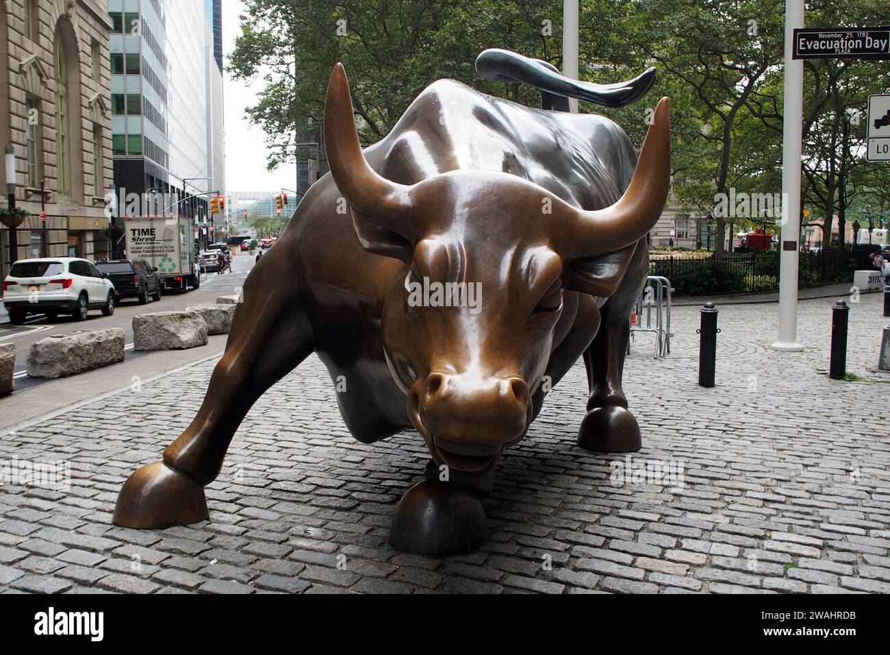 Charging Bull, aka the Wall Street Bull, bronze sculpture by Arturo Di Modica, on Broadway at ...