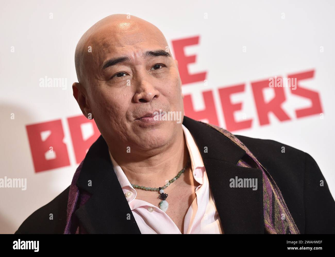 Hollywood, USA. 04th Jan, 2024. Ron Yuan arriving to Netflix's ‘The Brothers Sun' World Premiere ...