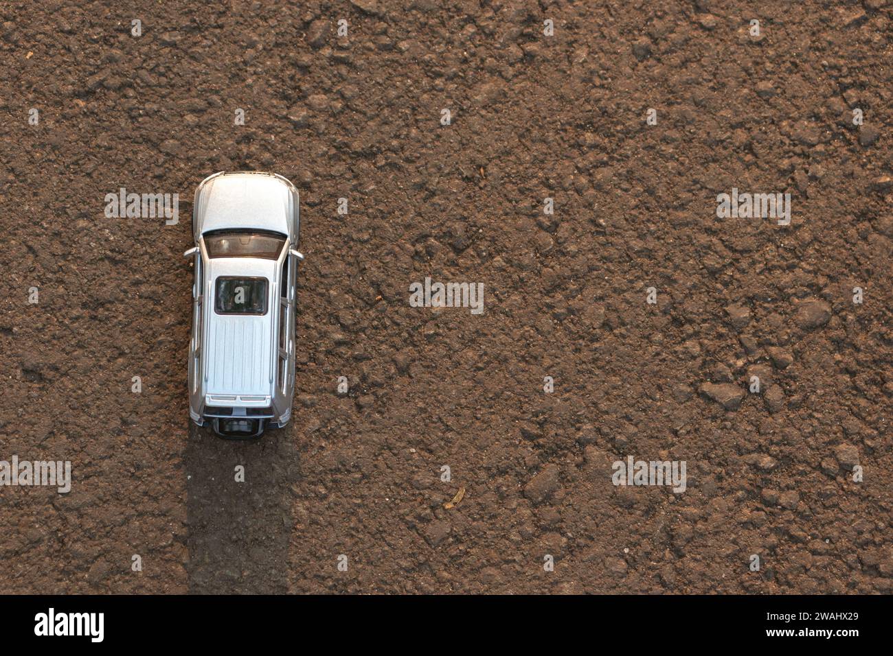 Concept for traveling and outdoor activities. Photo of a toy car on the ...