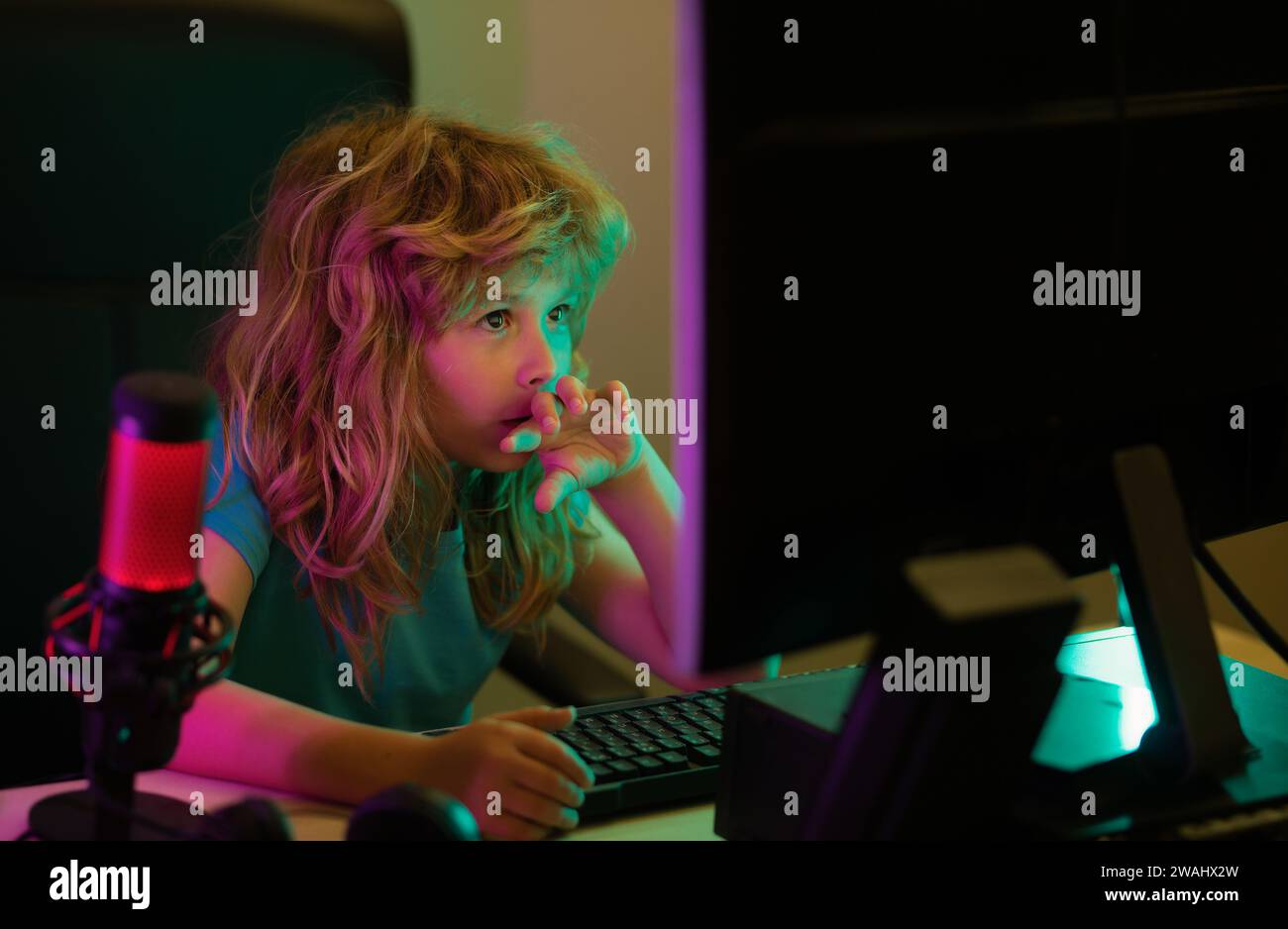 Child computer late night neon hi-res stock photography and images - Alamy