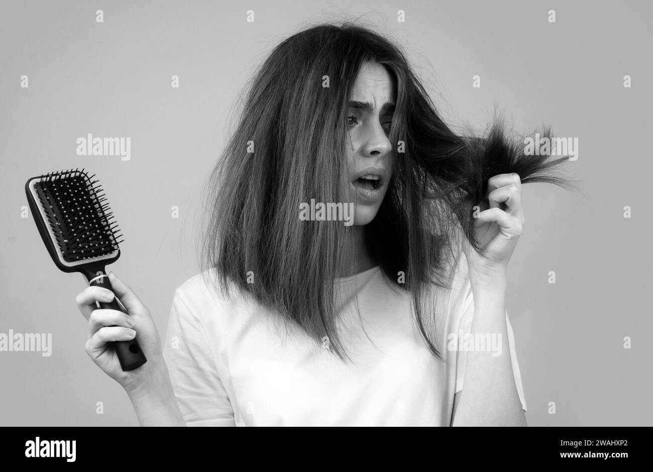 Damaged hairstyle Black and White Stock Photos & Images - Alamy