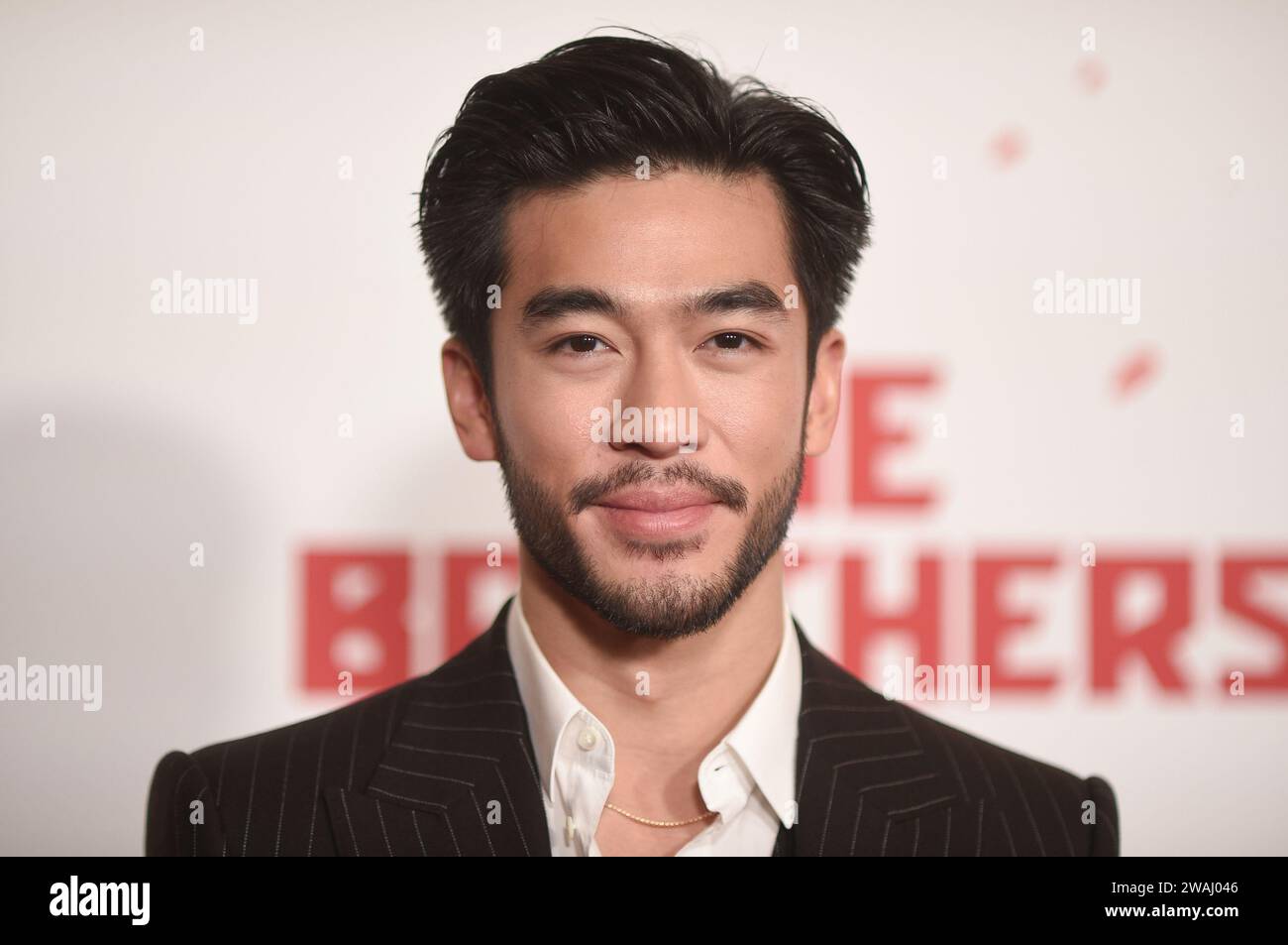 Justin Chien arrives at the premiere of "The Brothers Sun" on Thursday ...