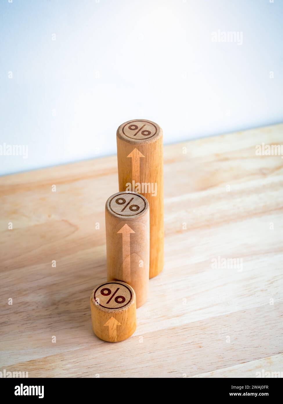 Percentage icon on top of wooden block bar graph step with rise up ...