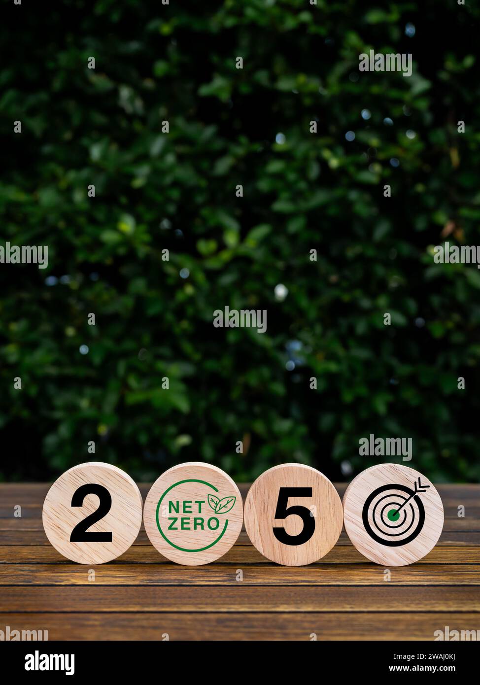 2050 year number with Net Zero icon and target symbol on wooden blocks ...