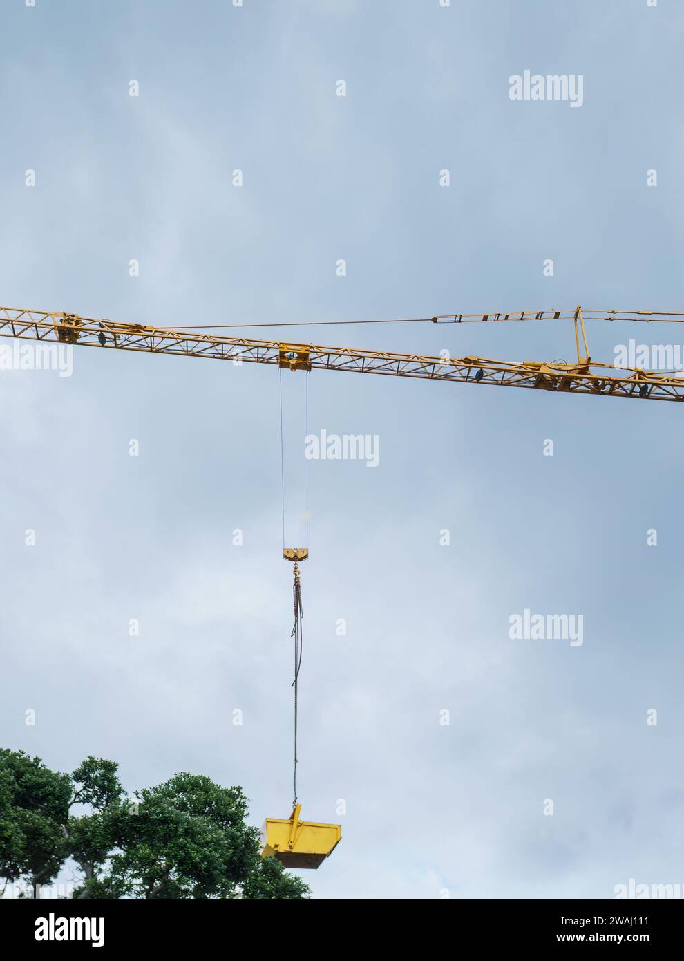 Bright yellow construction crane hi-res stock photography and images ...