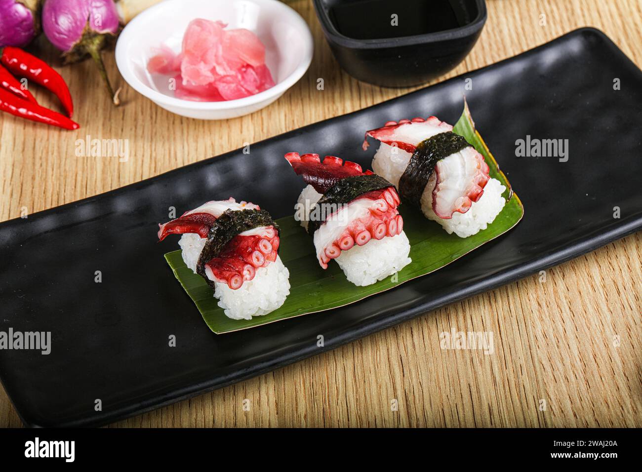 Japanese cuisine - sushi with octopus served ginger Stock Photo - Alamy