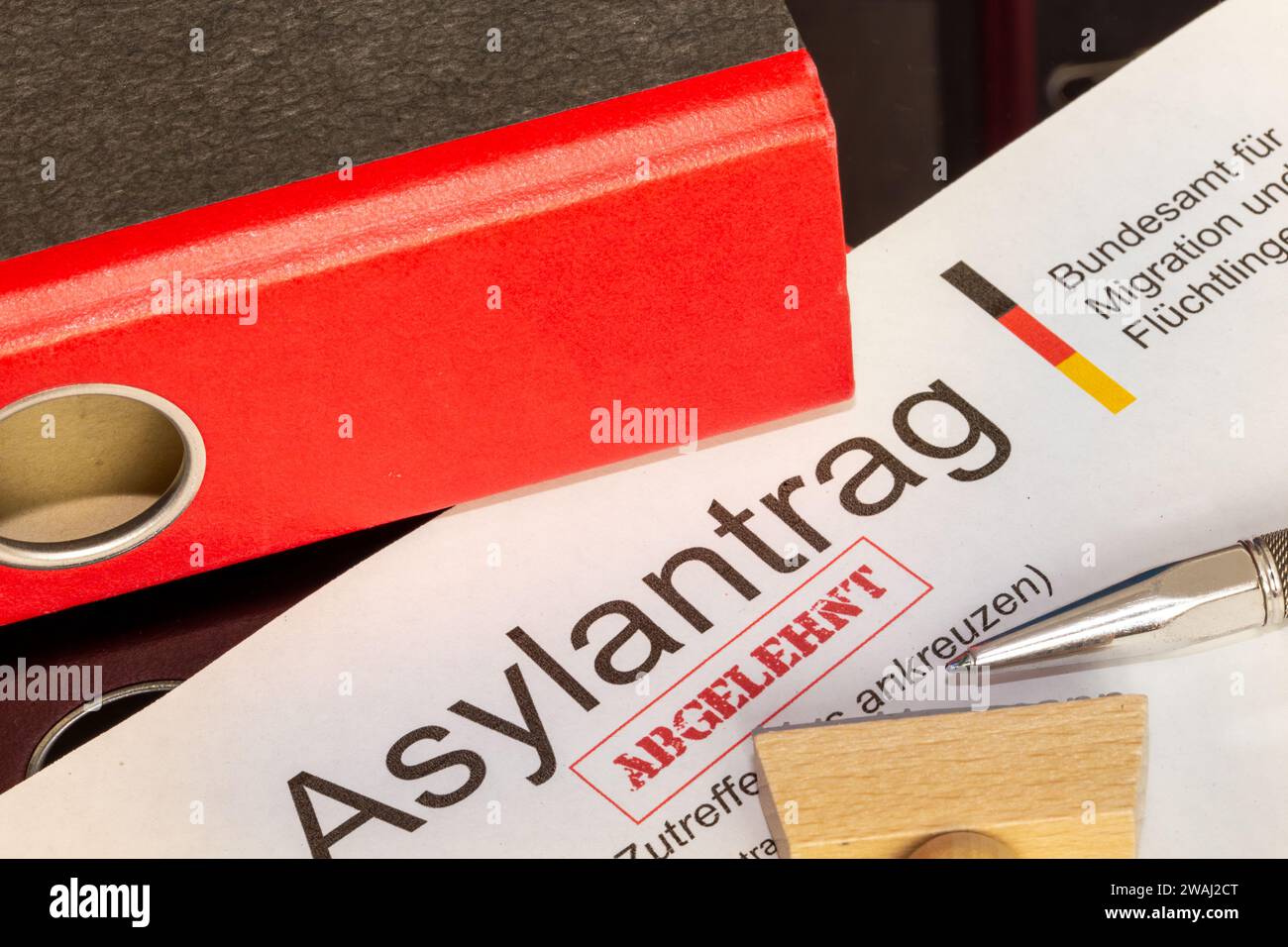 Symbol image: Application form for asylum in Germany Stock Photo - Alamy