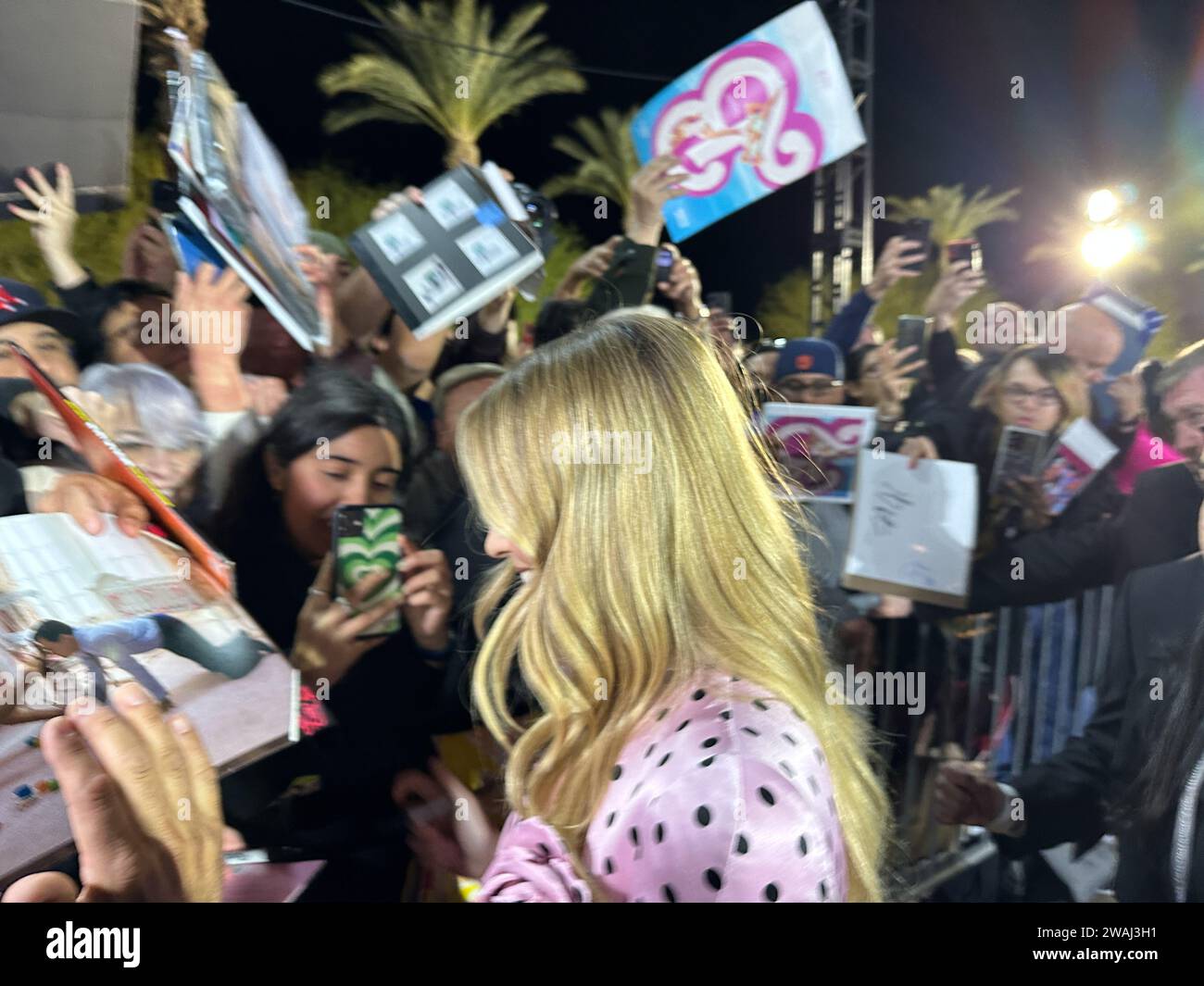 Palm Springs, California, U.S.A. 4th Jan, 2024. Margot Robbie signs ...