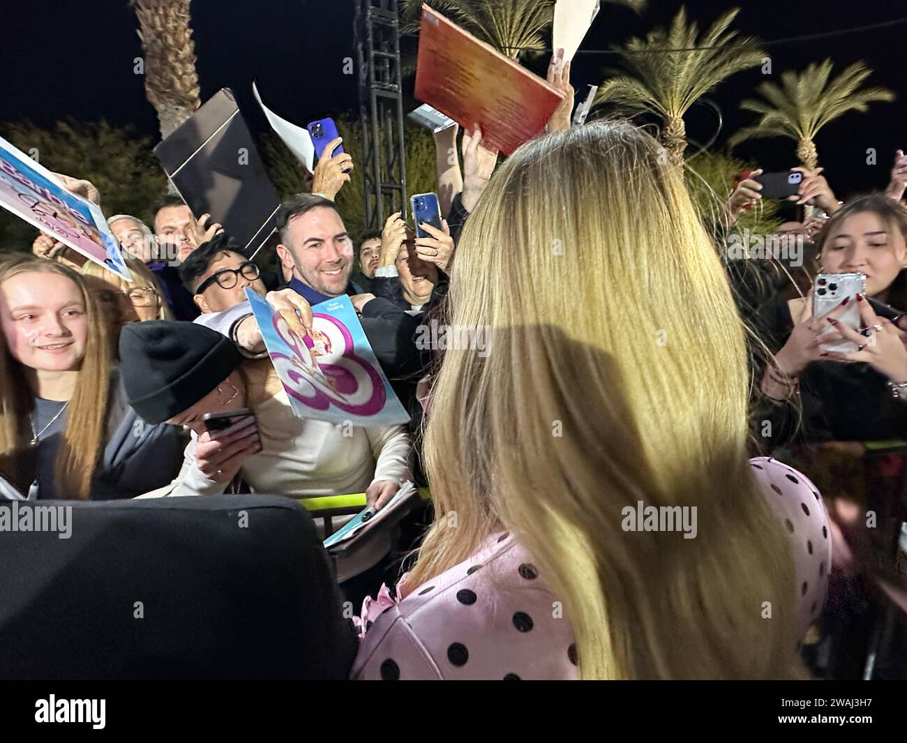 Palm Springs, California, U.S.A. 4th Jan, 2024. Margot Robbie signs ...