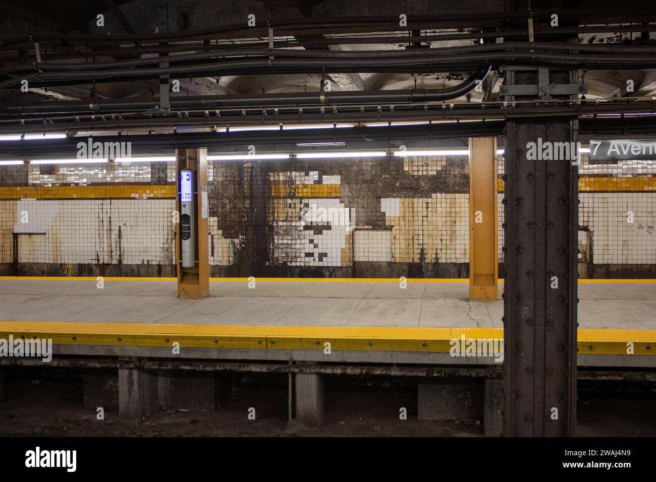 An urban subway station with vintage walls rusting surfaces and broken ...