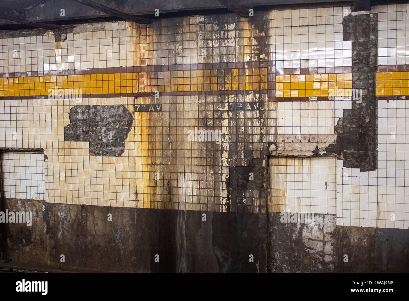 An urban subway station with vintage walls rusting surfaces and broken ...