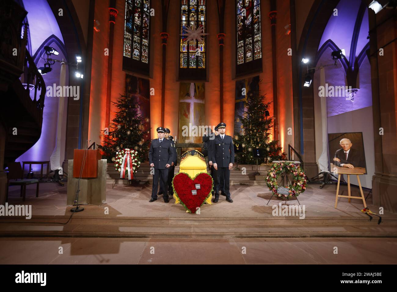 Offenburg, Germany. 05th Jan, 2024. Police officers stand by the coffin ...