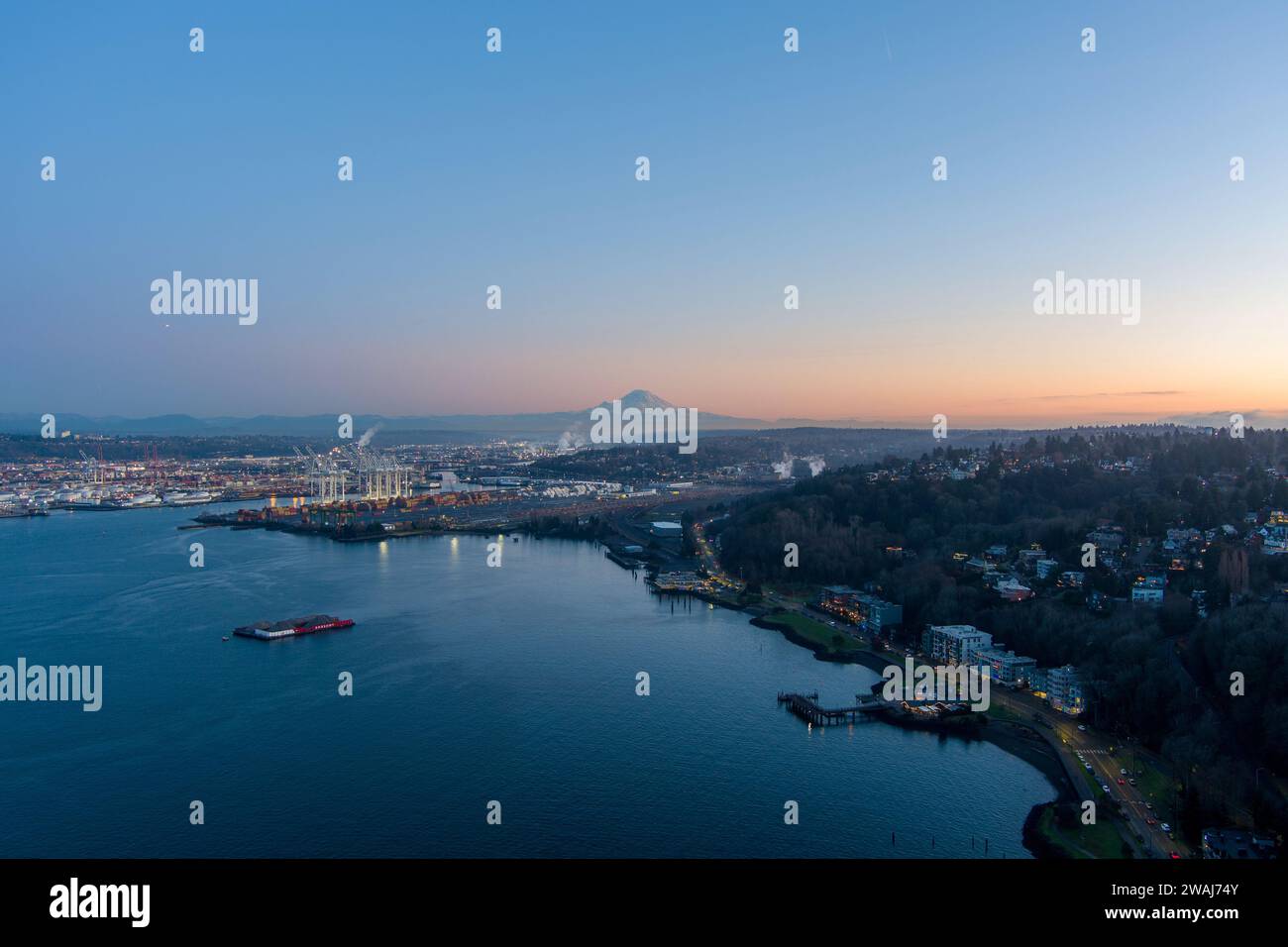 Aerial view of Mount Rainier and West Seattle at sunset in December ...