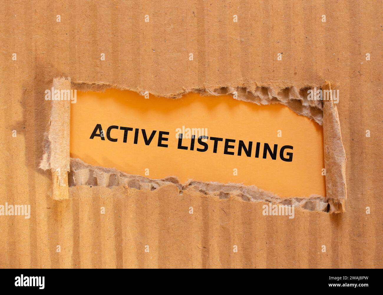 Active listening lettering on ripped paper. Top view, copy space Stock ...
