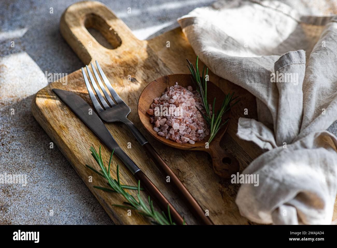From above rustic kitchen setup on wooden cutting board with a fork ...