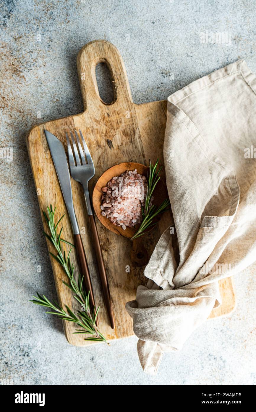 From above rustic kitchen setup on wooden cutting board with a fork ...