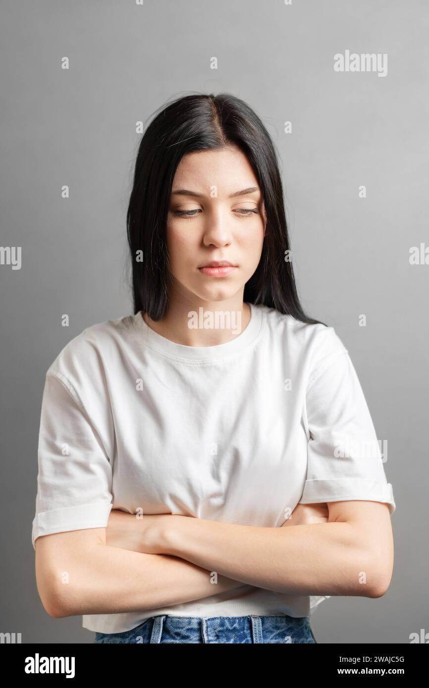Portrait of a young teenager girl who looks sad Stock Photo - Alamy