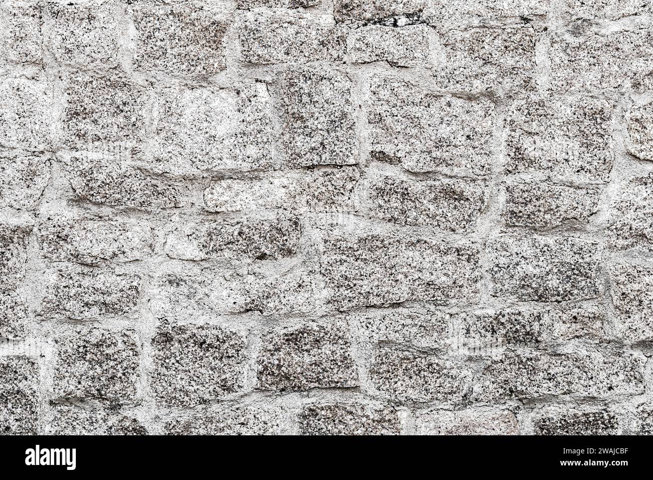Old light gray stone wall background. Closeup front view of stone wall ...