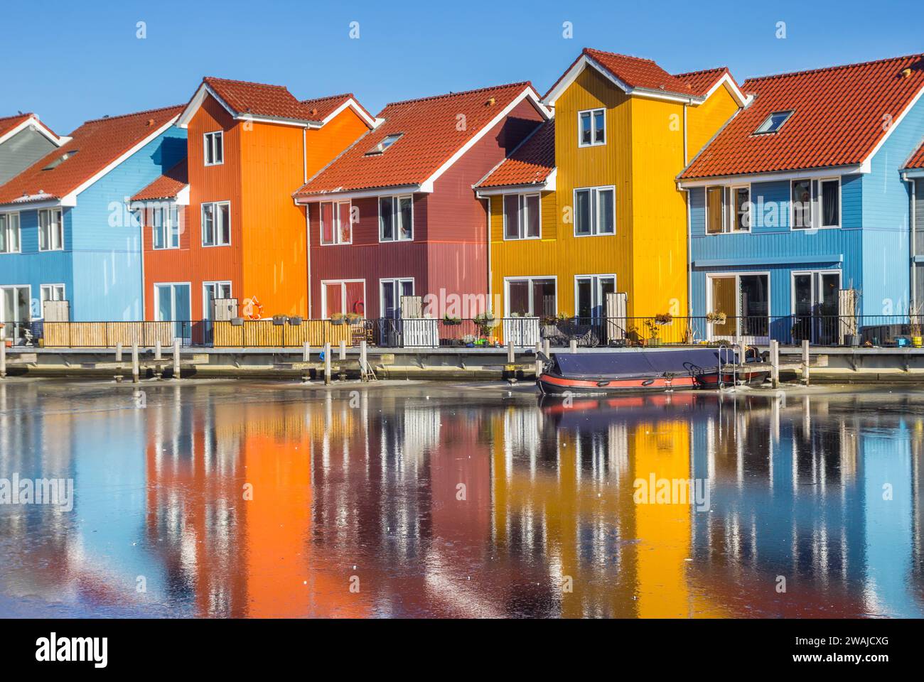 Colorful houses reitdiephaven harbor hi-res stock photography and ...