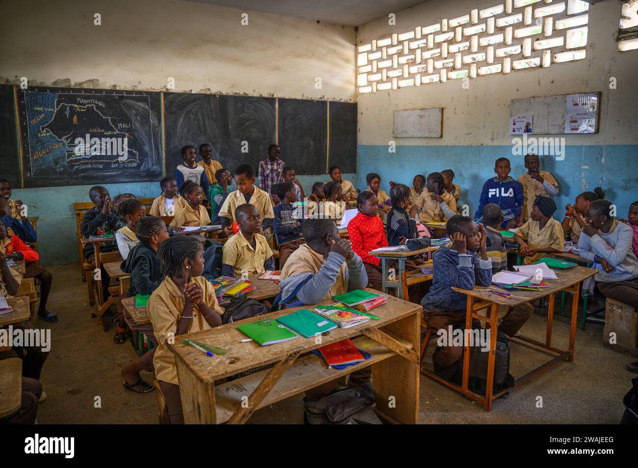 African children sitting at their desks in a classroom in a primary ...