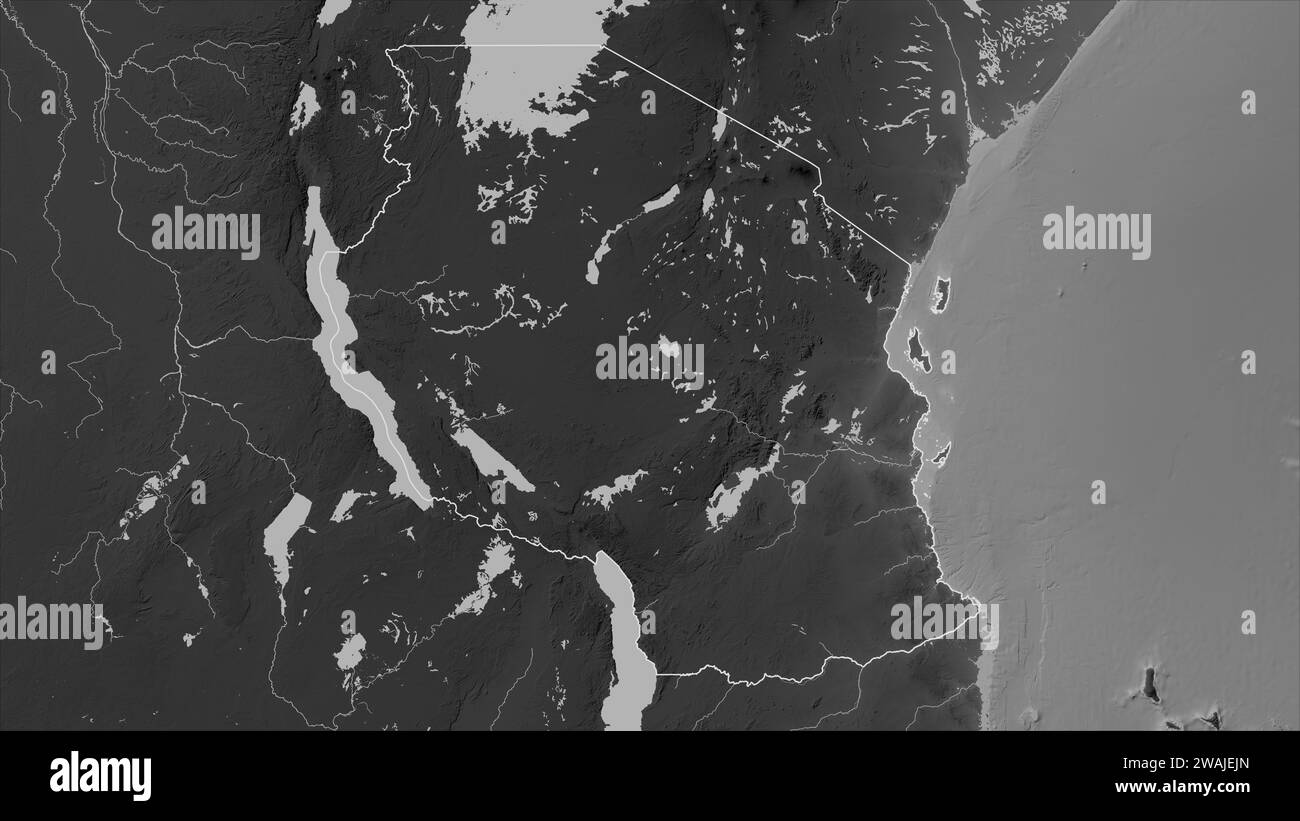 Tanzania outlined on a Grayscale elevation map with lakes and rivers ...