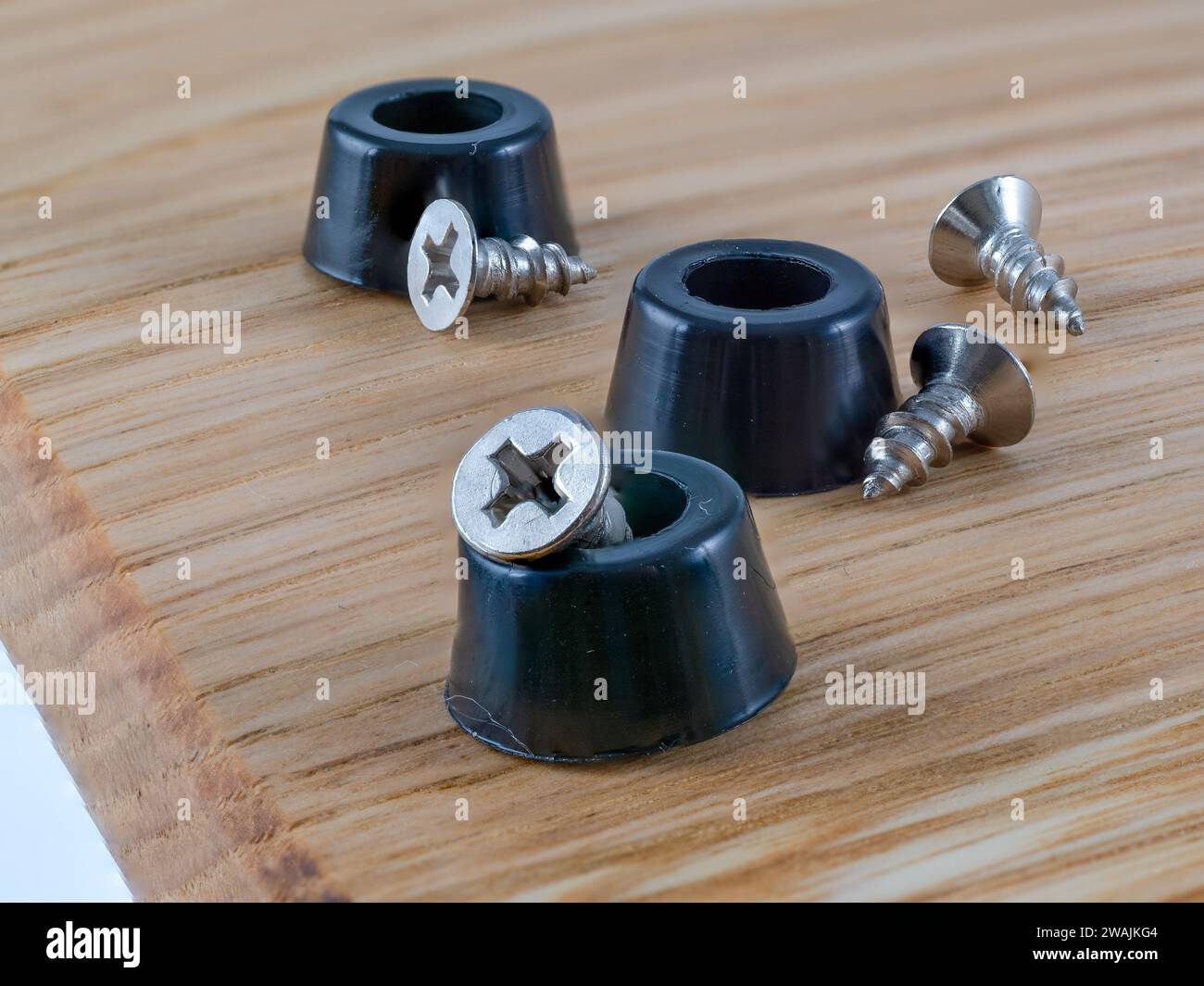 extreme macro close up of black rubber cutting serving board feet with ...