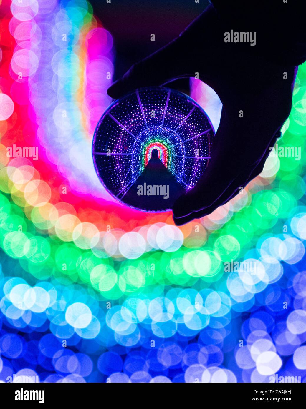 Fun shot of a light tunnel as seen in a glass lensball with rainbow ...