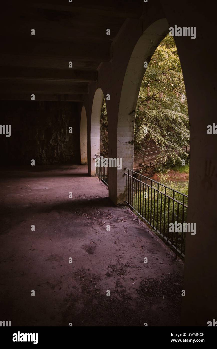 A vertical of Dunbar cave with arched balconies Stock Photo - Alamy