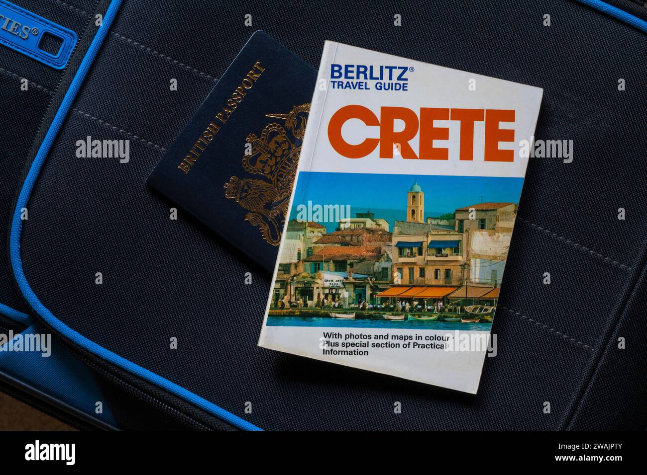 Crete Berlitz Travel Guide book with British passport on suitcase ...