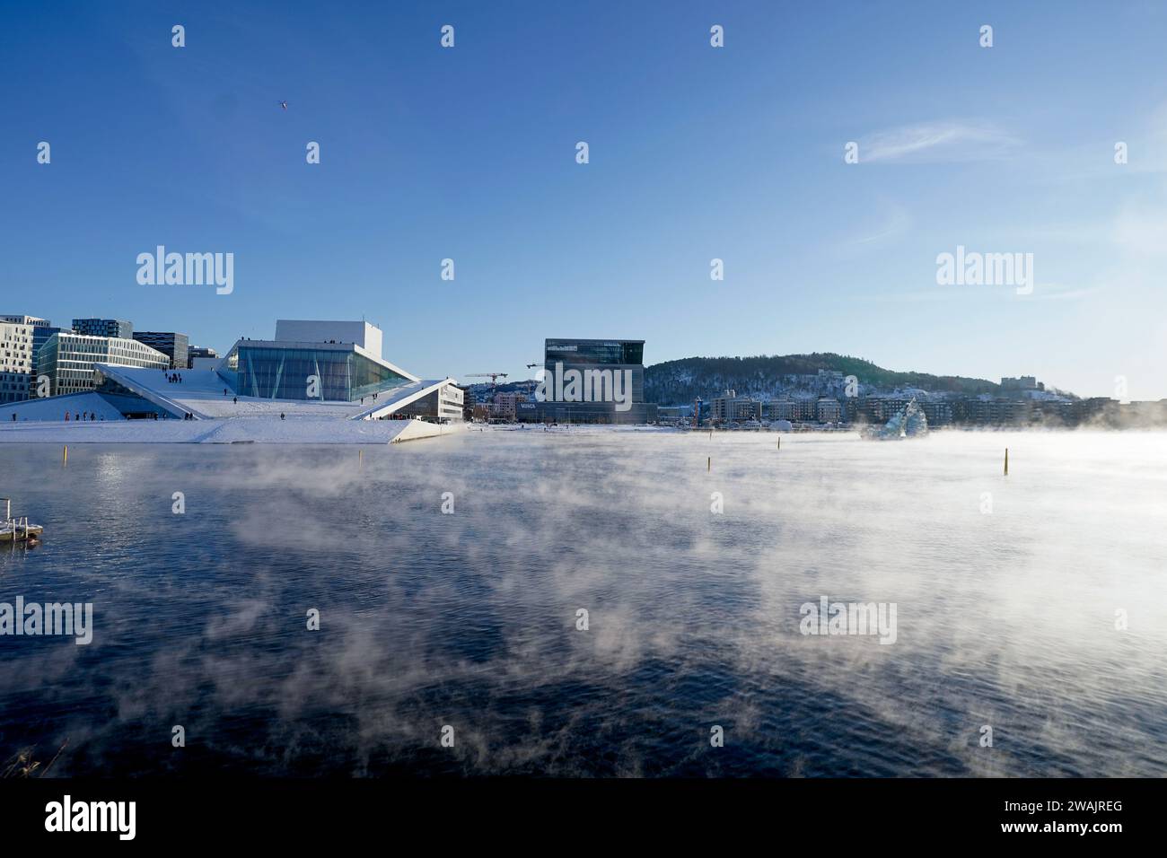 Oslo 20240105.Frost smoke over the Oslofjord by the Opera House. The ...