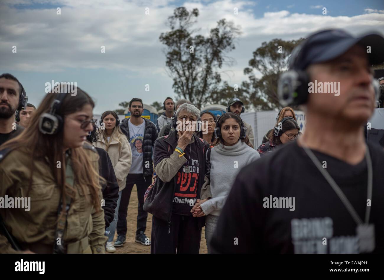 05 January 2024, Israel, Re'im: Survivors and families of the victims ...