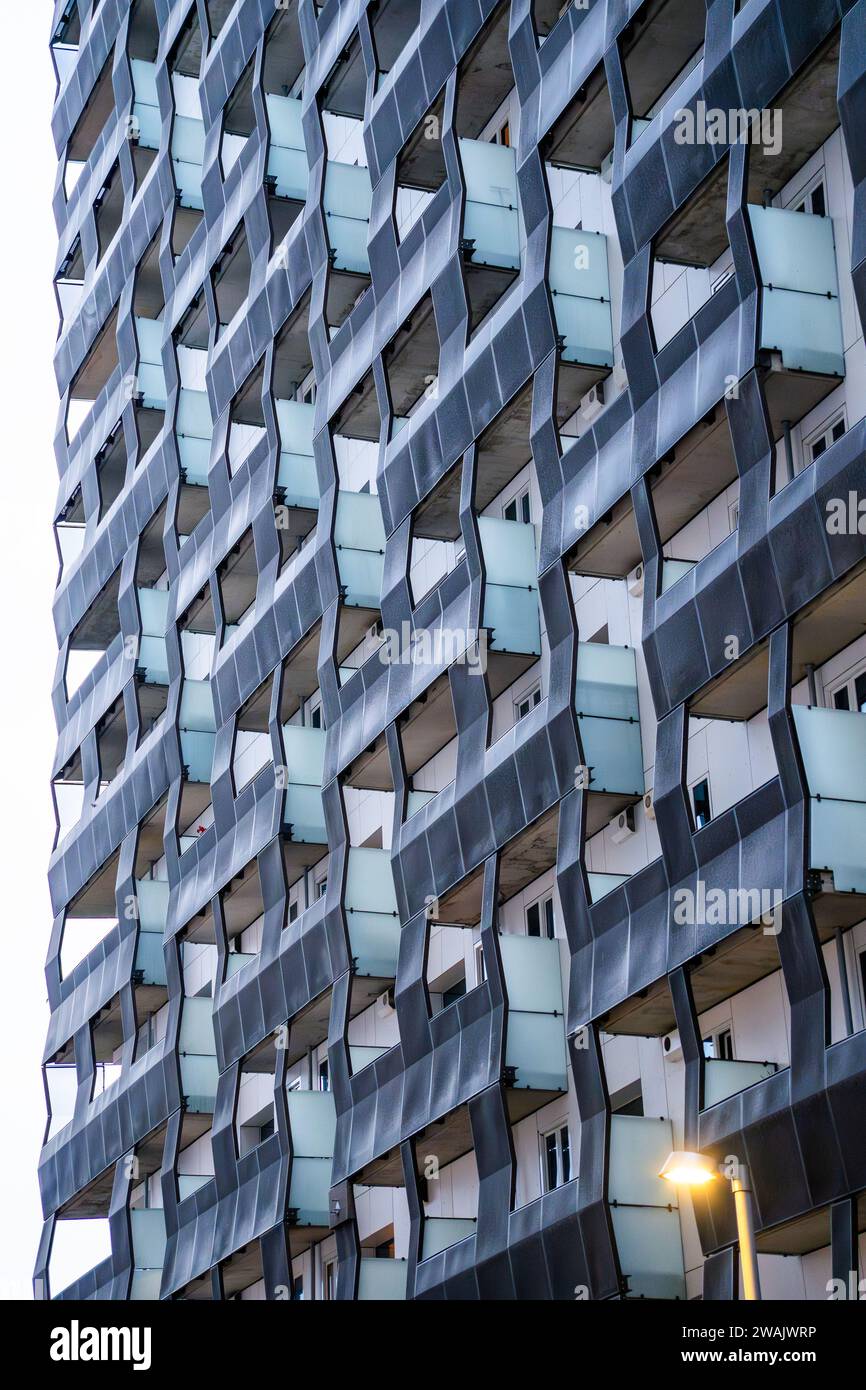 A modern multi-level building with balconies Stock Photo - Alamy