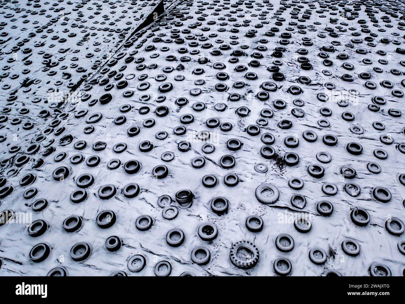 Rehna, Germany. 05th Jan, 2024. A feed silo is covered with a thin ...