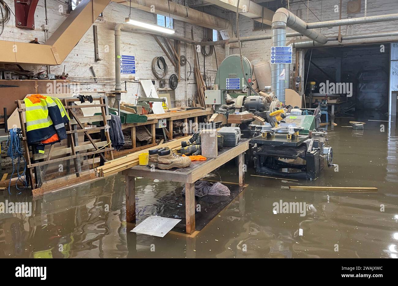 Flood water inside Kirk and Bill's, a furniture workshop in Newark-on ...