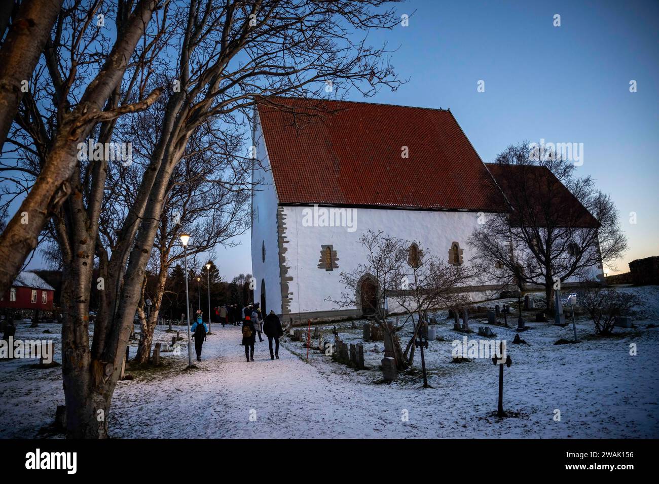 Trondenes, Norway. 13th Nov, 2023. People walk near the grounds of the ...