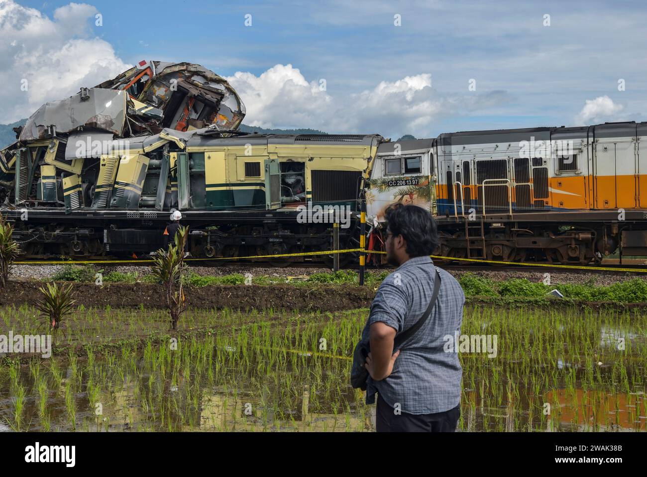 Bandung Regency, Indonesia. 05th Jan, 2024. Residents see a train that ...