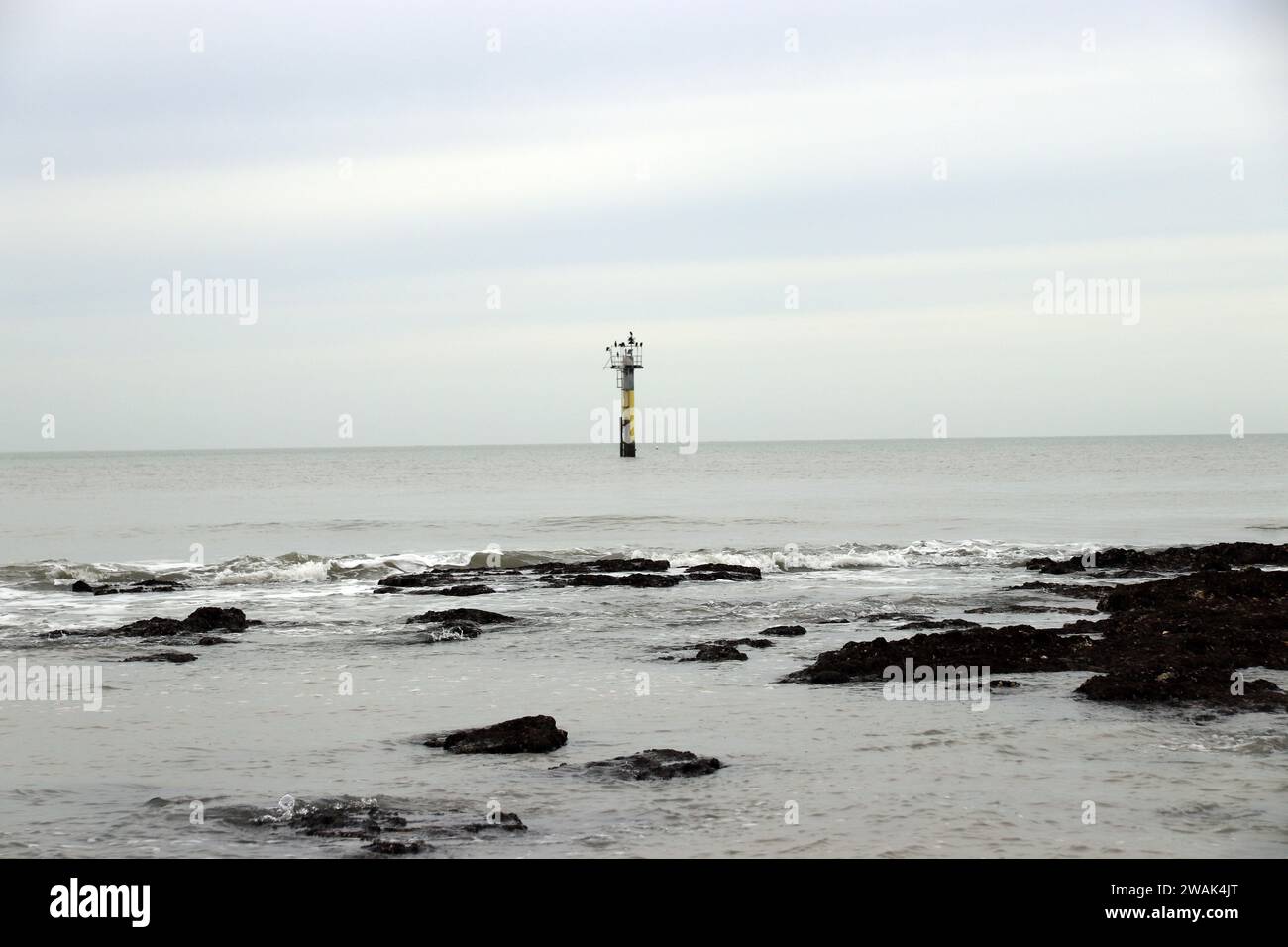 Channel Marker in the Bay off Margate, Kent in winter Stock Photo - Alamy