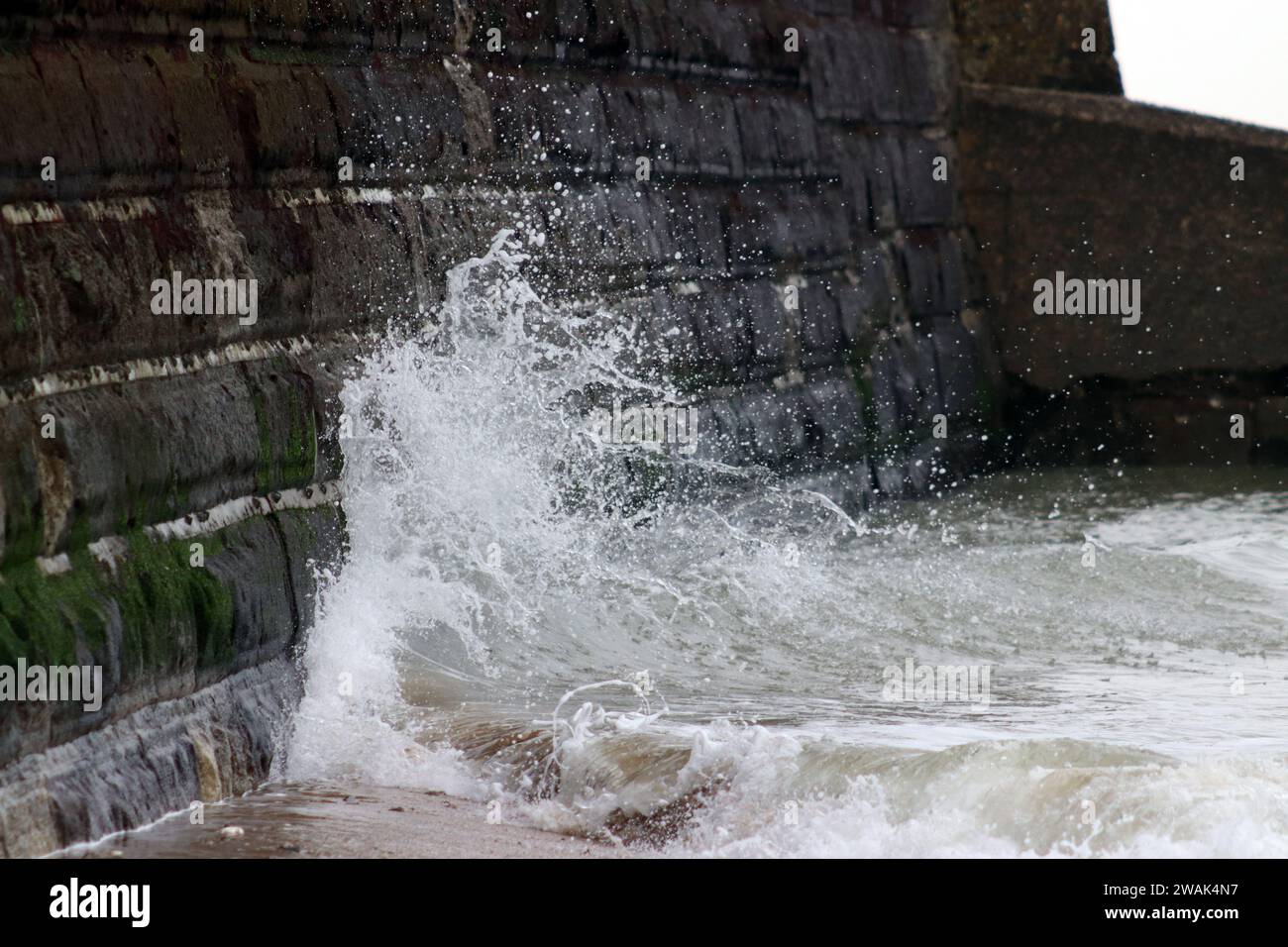 Hitting sea wall hi-res stock photography and images - Alamy