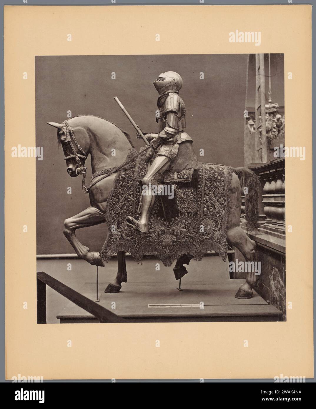 Setup of a sculpture of a horse with a saddle of textile and a harness ...