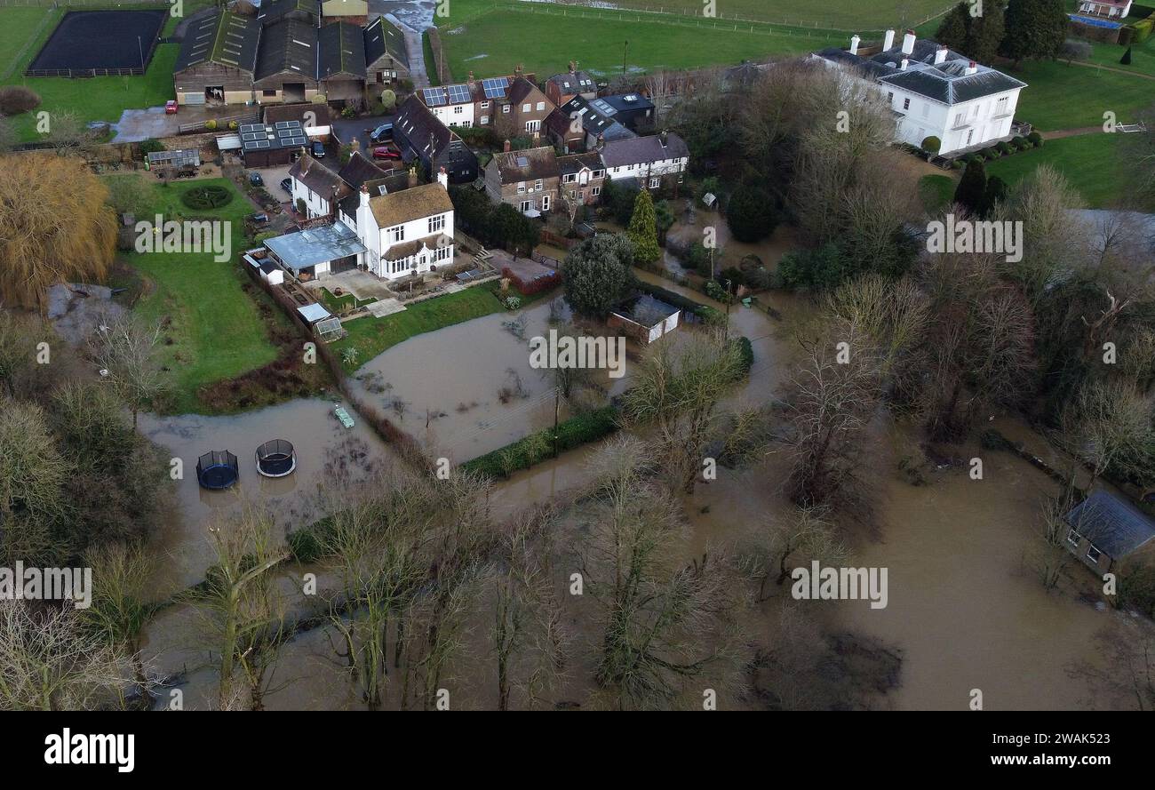 Flood waters from the River Ouse approach properties in Barcombe Mills ...