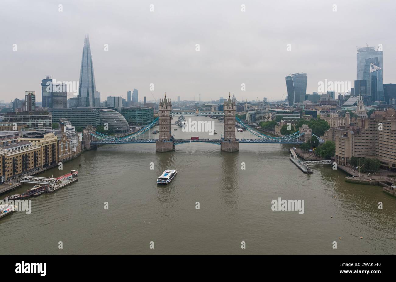 An aerial photograph showing the River Thames, Tower Bridge, The Shard ...