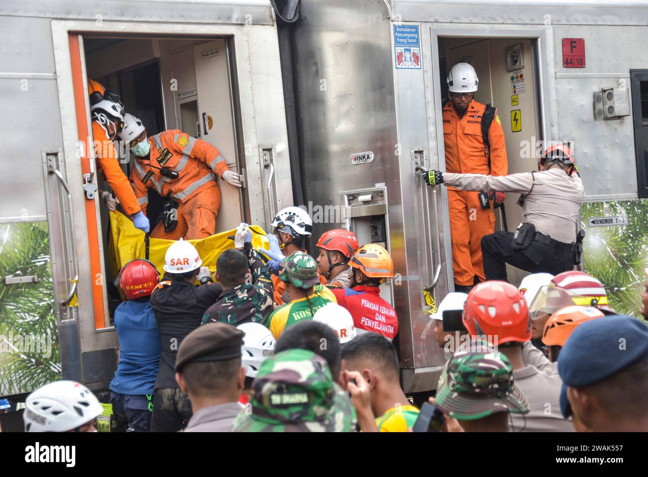 Bandung Regency, West Java, Indonesia. 5th Jan, 2024. Officers carry ...