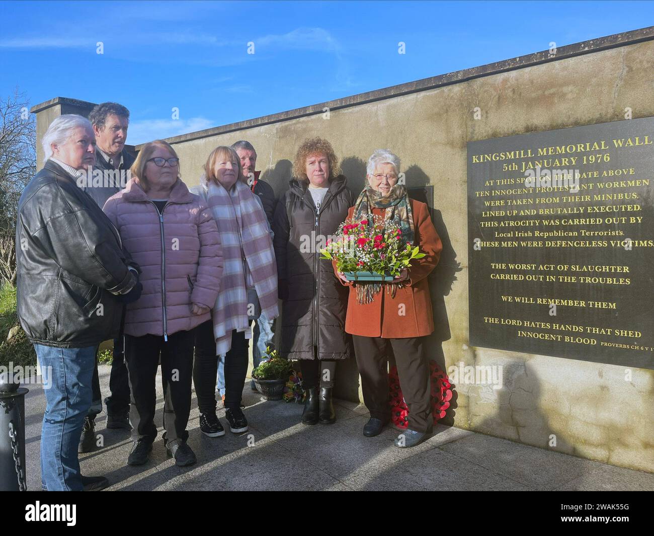 People attend a commemorative service for the 48th anniversary of the ...
