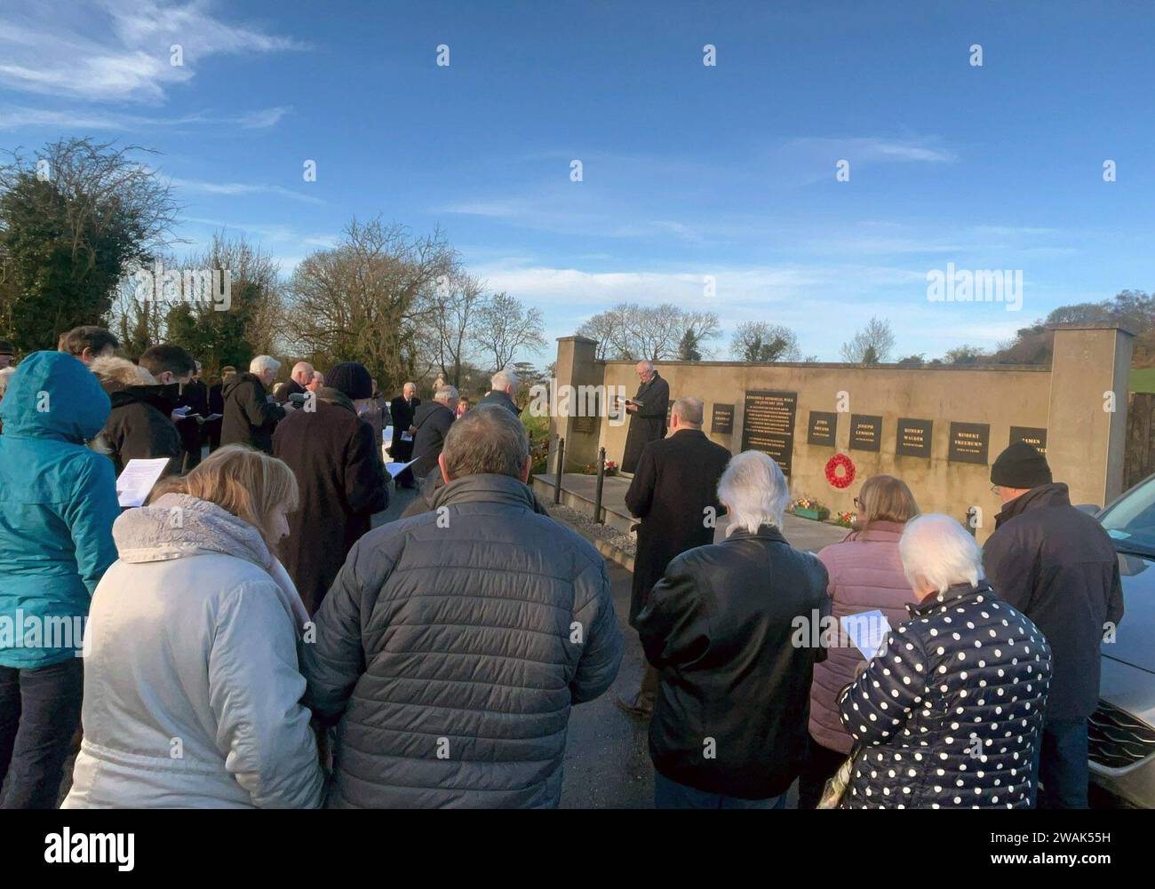 People attend a commemorative service for the 48th anniversary of the ...