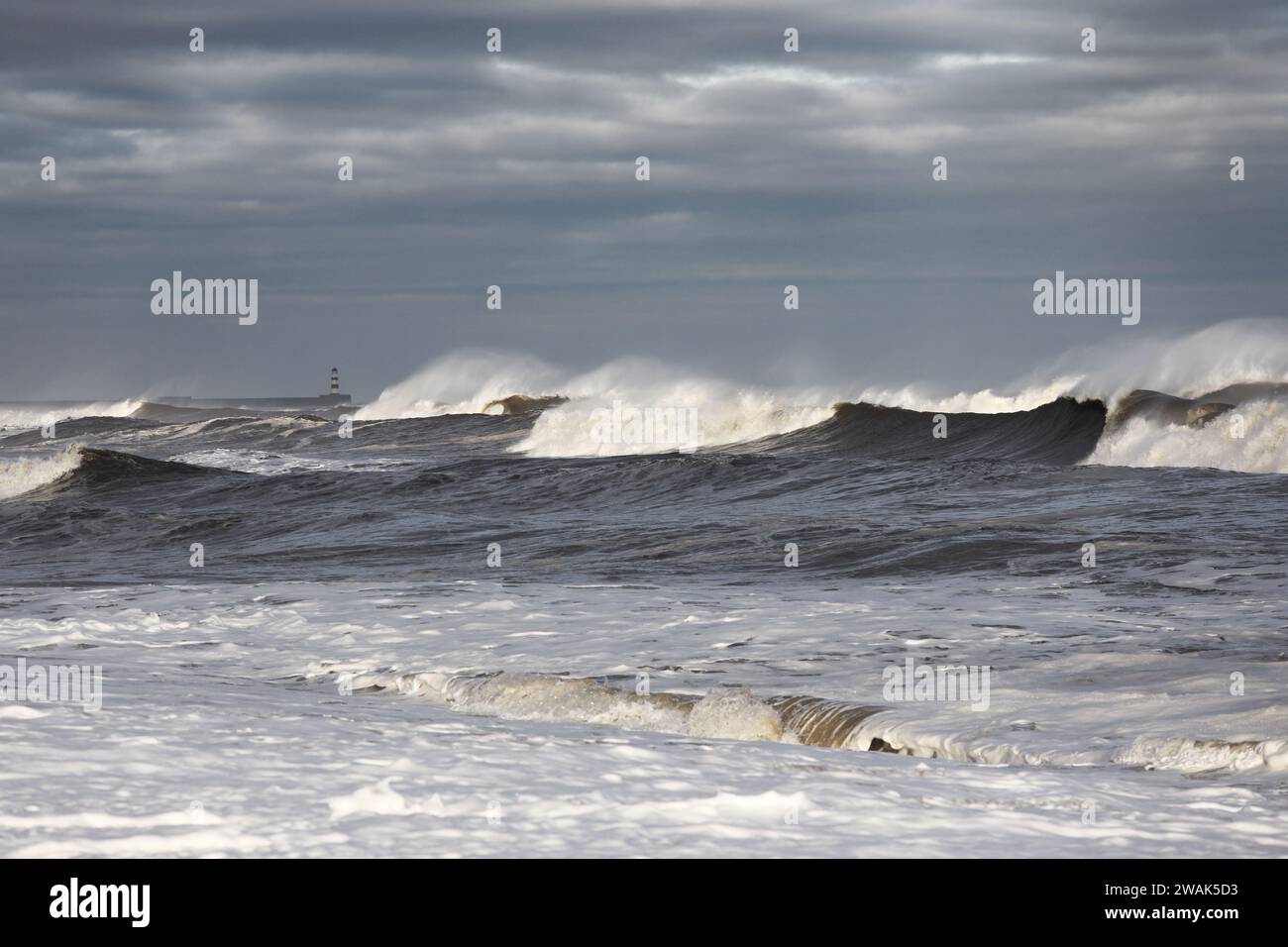 Stormy seas in the wake of Storm Henk with Seaham lighthouse in the ...