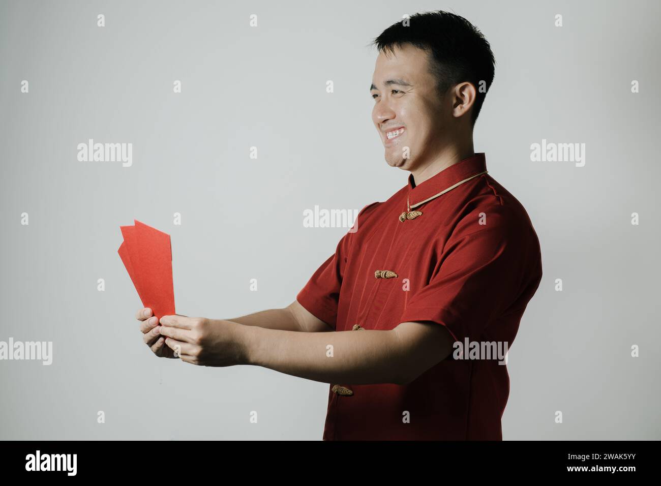 Smile face of Asian man wearing Cheongsam or Chinese traditional cloth ...