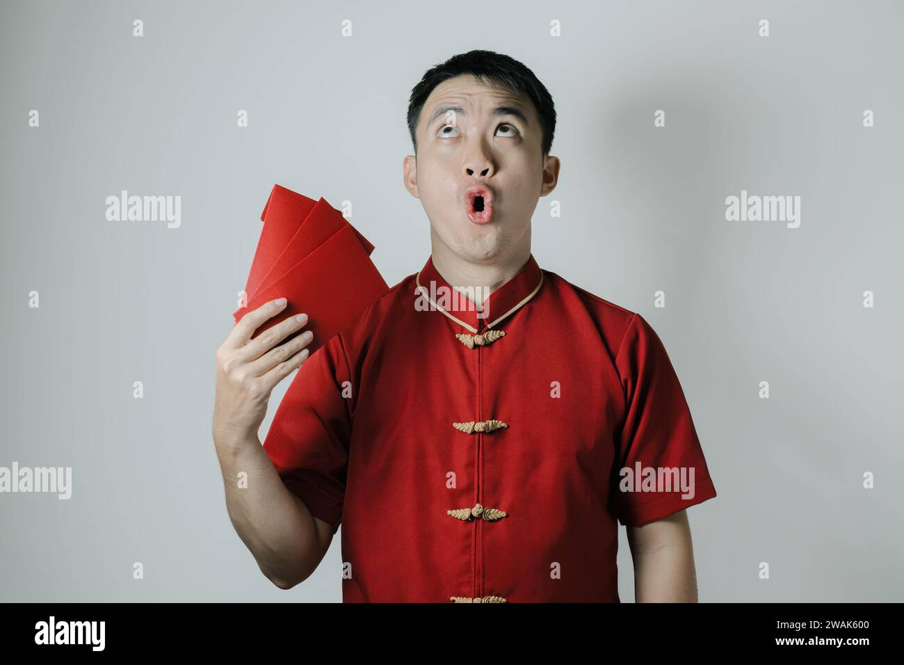 Shocked face of Asian man wearing Cheongsam or Chinese traditional ...