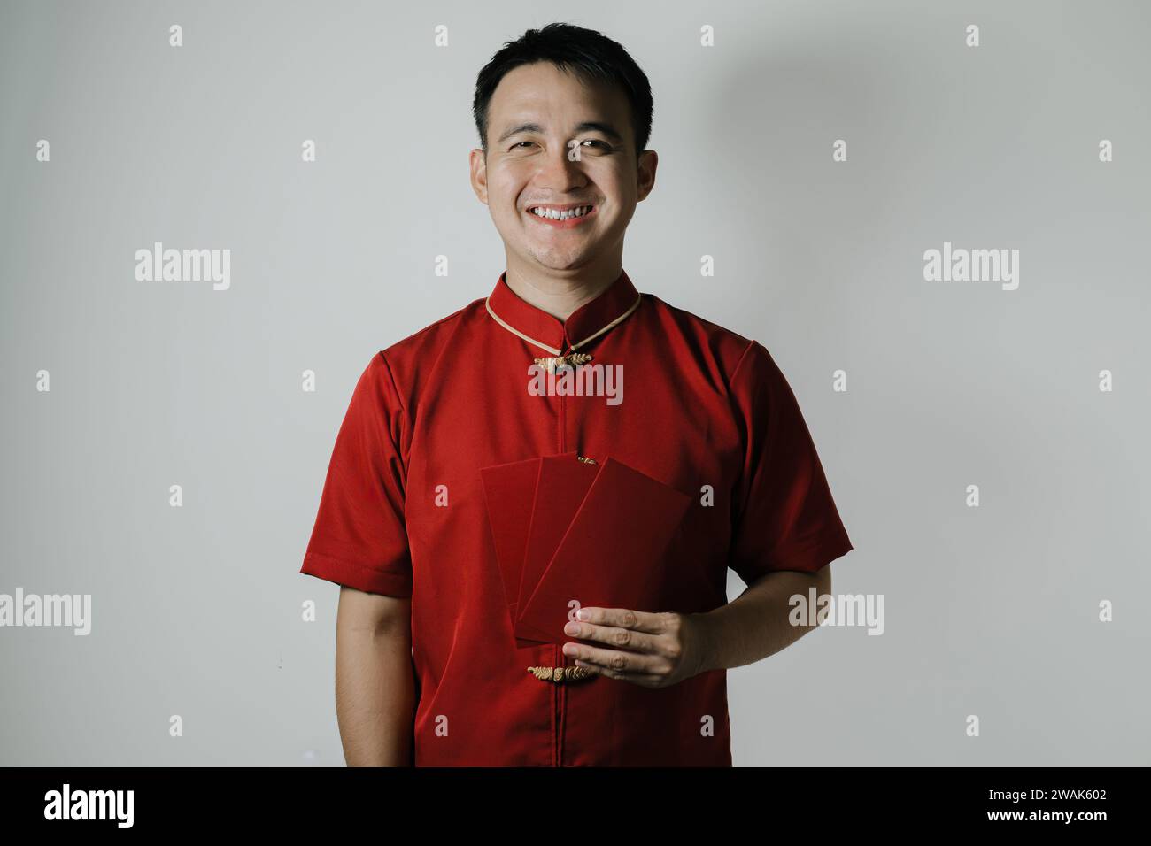 Happy face of Asian man wearing Cheongsam or Chinese traditional cloth ...