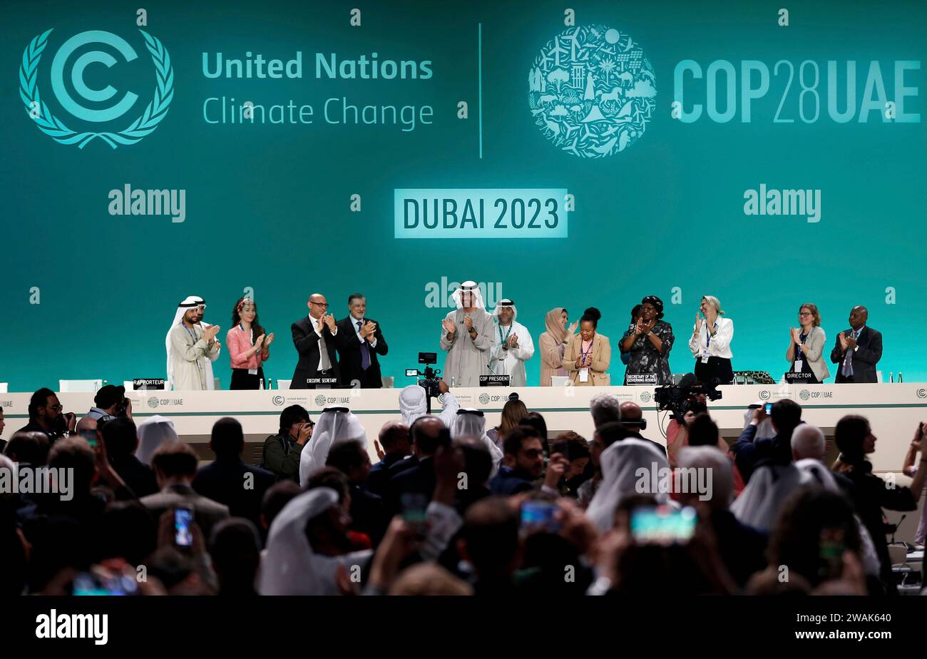 Beijing, United Arab Emirates (UAE). 13th Dec, 2023. Attendees applaud ...